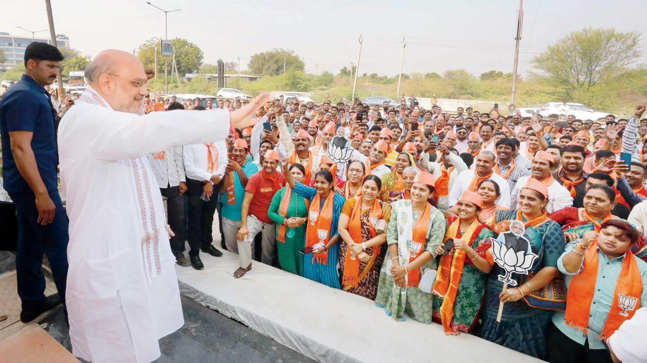 gujarat election 2022 amit shah accompanies bjp s sanand candidate kanu ...